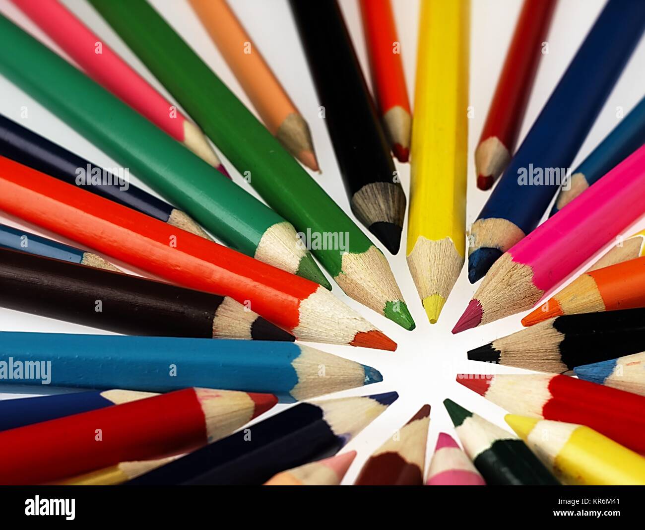 Colorful wooden crayons closely Stock Photo - Alamy