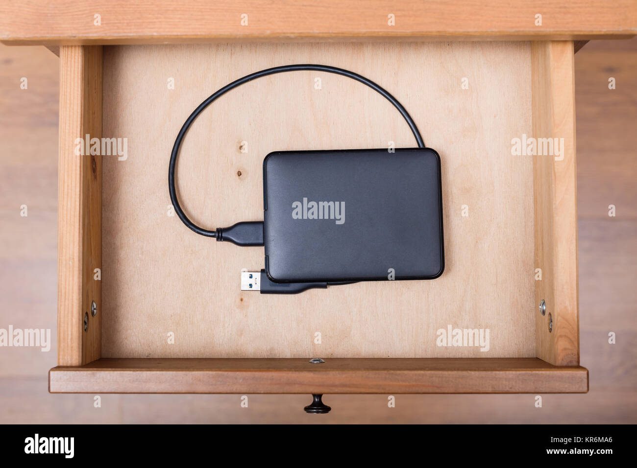 external computer hard drive in open drawer Stock Photo - Alamy