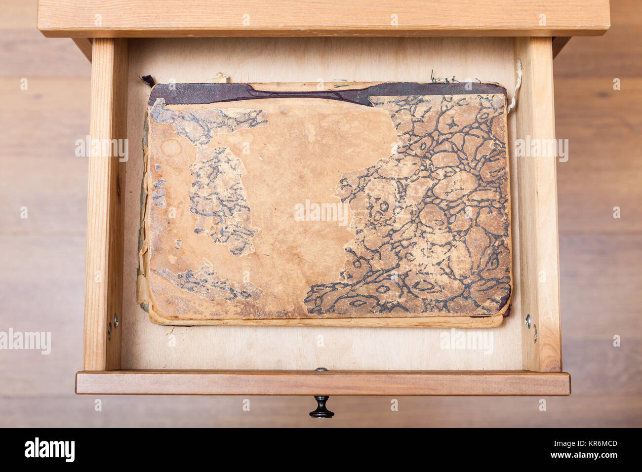 ancient book in open drawer Stock Photo - Alamy