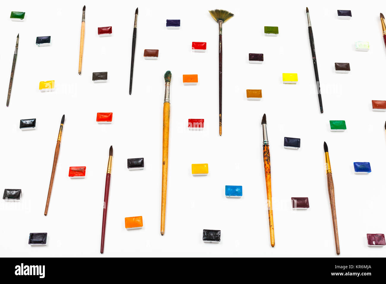 side view of many paint brushes and watercolors Stock Photo - Alamy