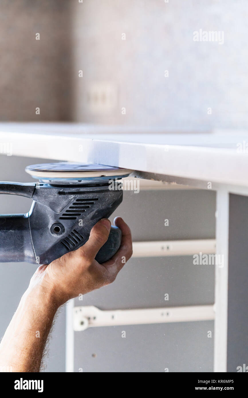 Worker installing new countertop hi-res stock photography and images ...