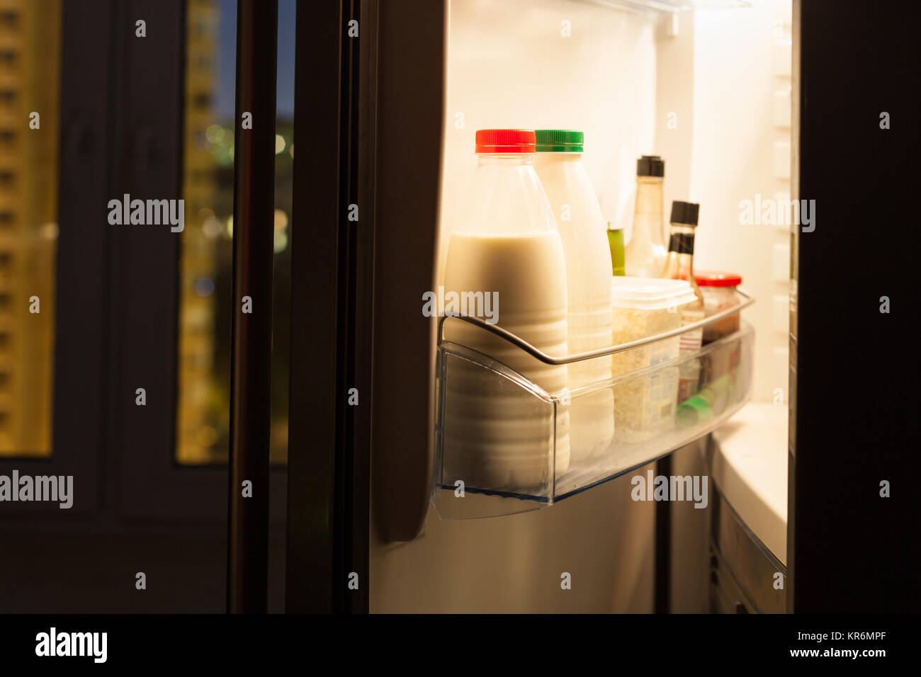 home fridge with dairy products in night Stock Photo - Alamy