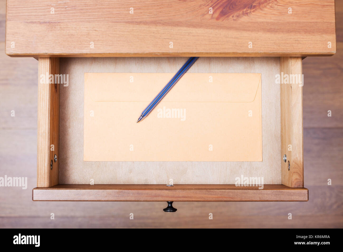 modern pen and envelope in open drawer Stock Photo - Alamy
