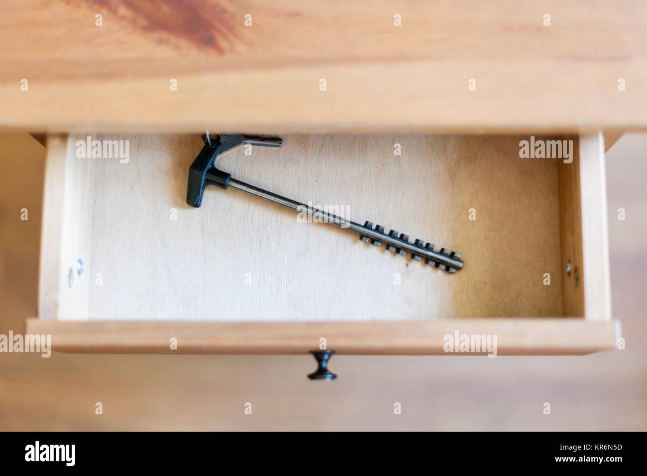 long latchkey in open drawer Stock Photo - Alamy