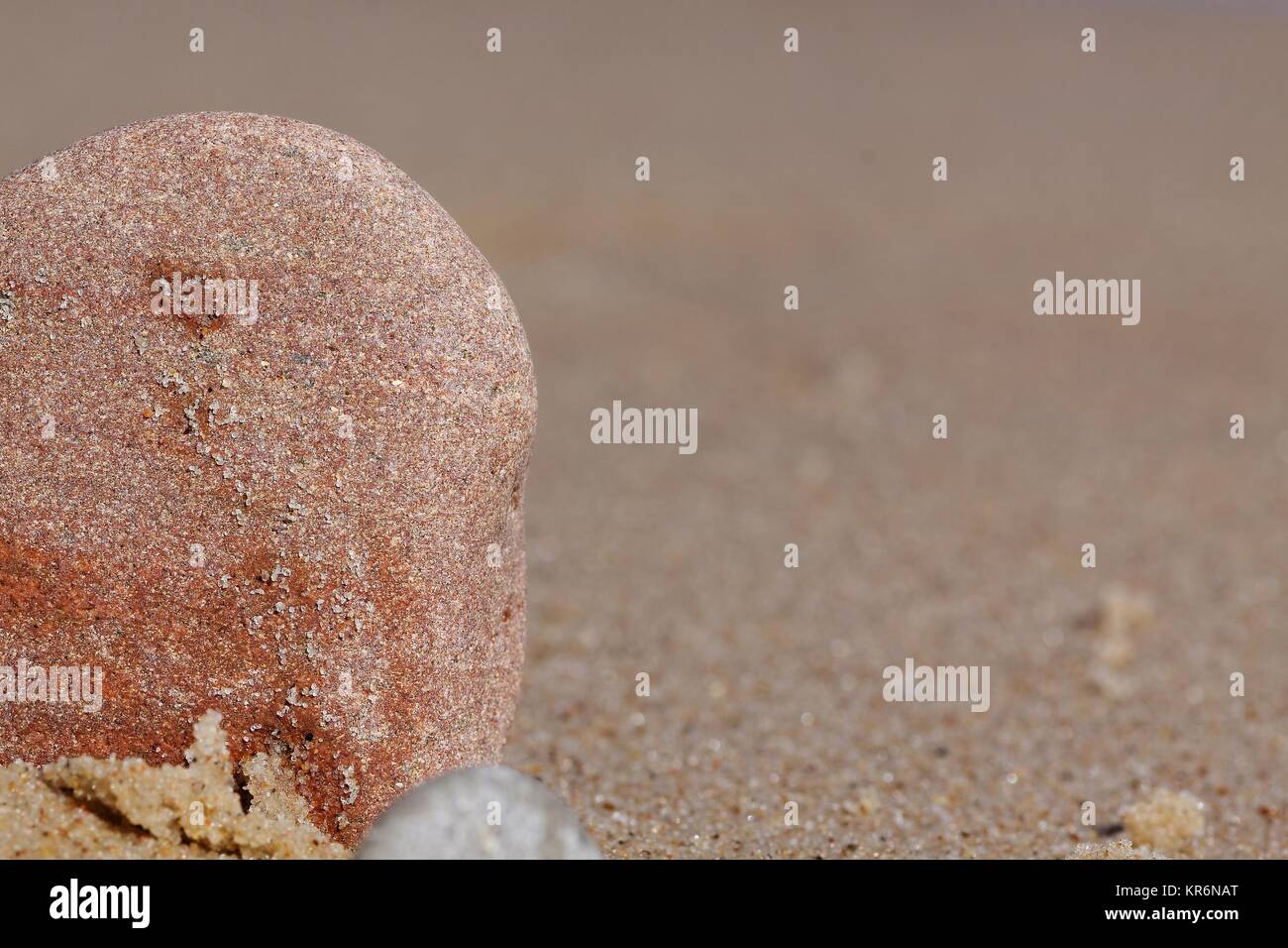 Small stones on the beach Stock Photo - Alamy