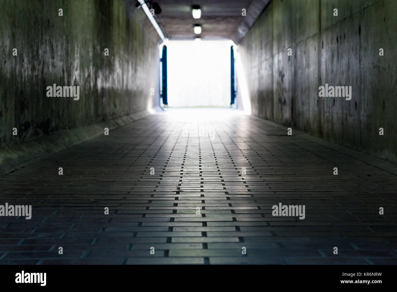 Thames Barrier passageway in London, a dim and concrete corridor ...