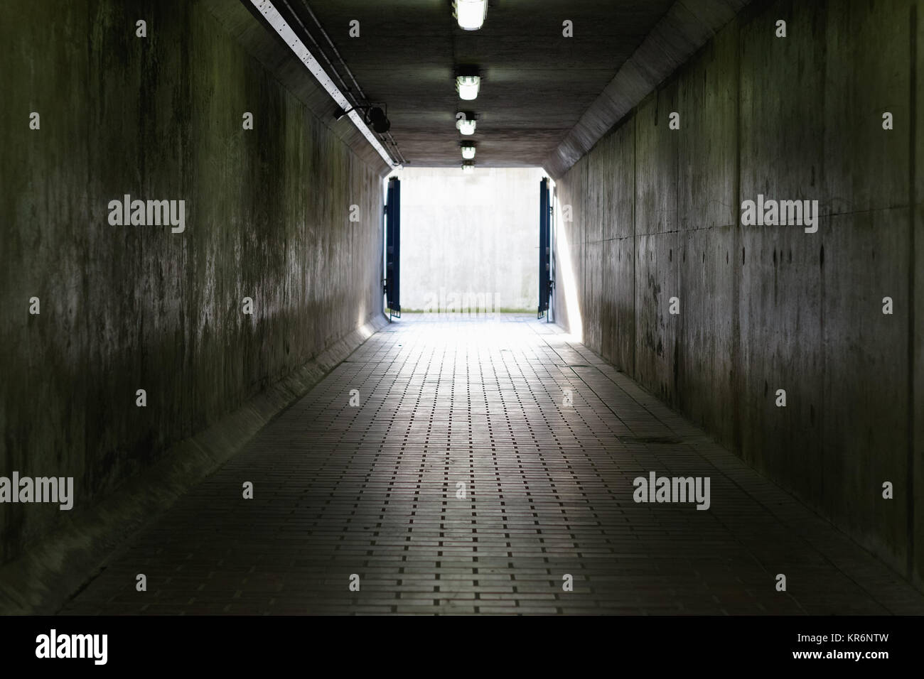 Thames Barrier passageway in London, a dim and concrete corridor ...