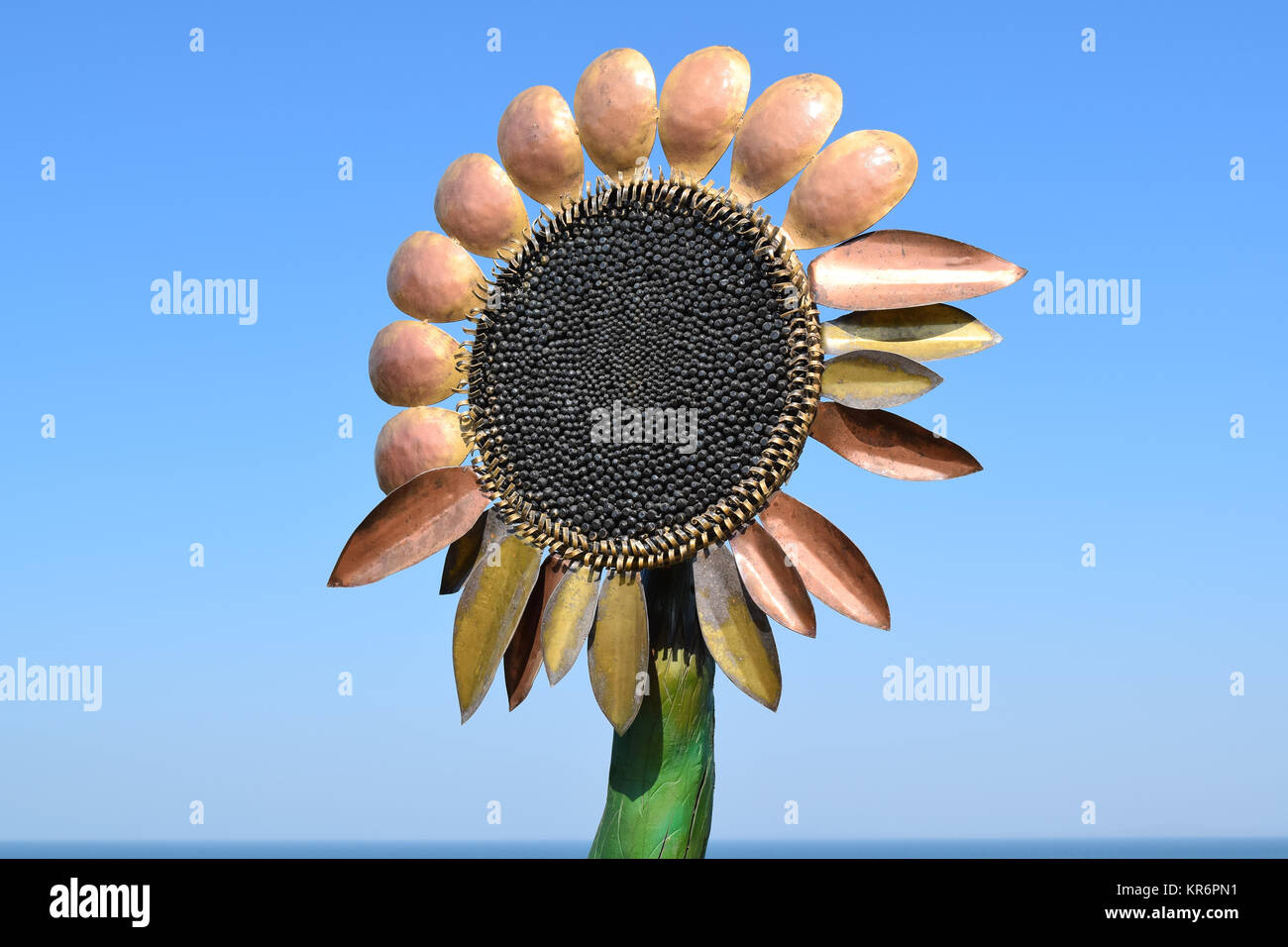 Statue of copper flower sunflower Stock Photo - Alamy