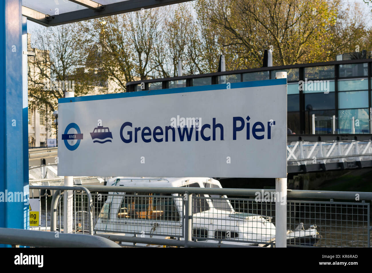 The signpost showing the dockside at Greenwich pier Sign for Greenwich ...