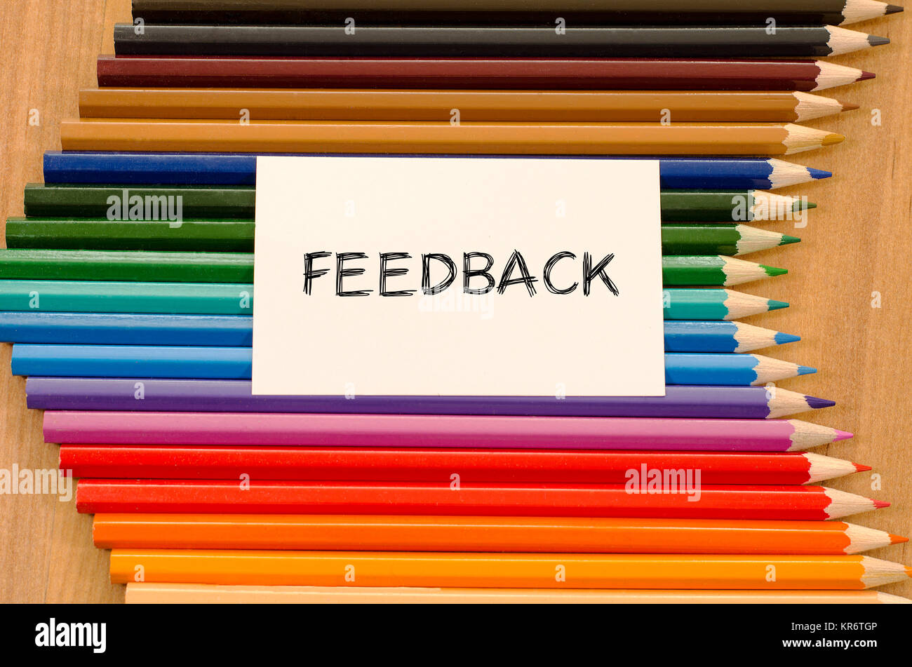Feedback text concept over pencil background Stock Photo - Alamy