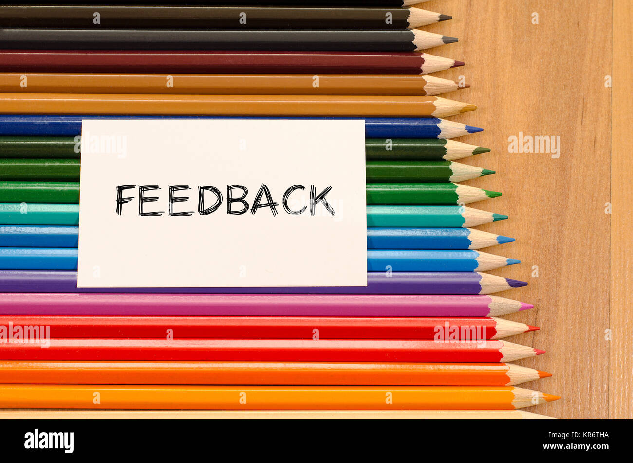 Feedback text concept over pencil background Stock Photo - Alamy