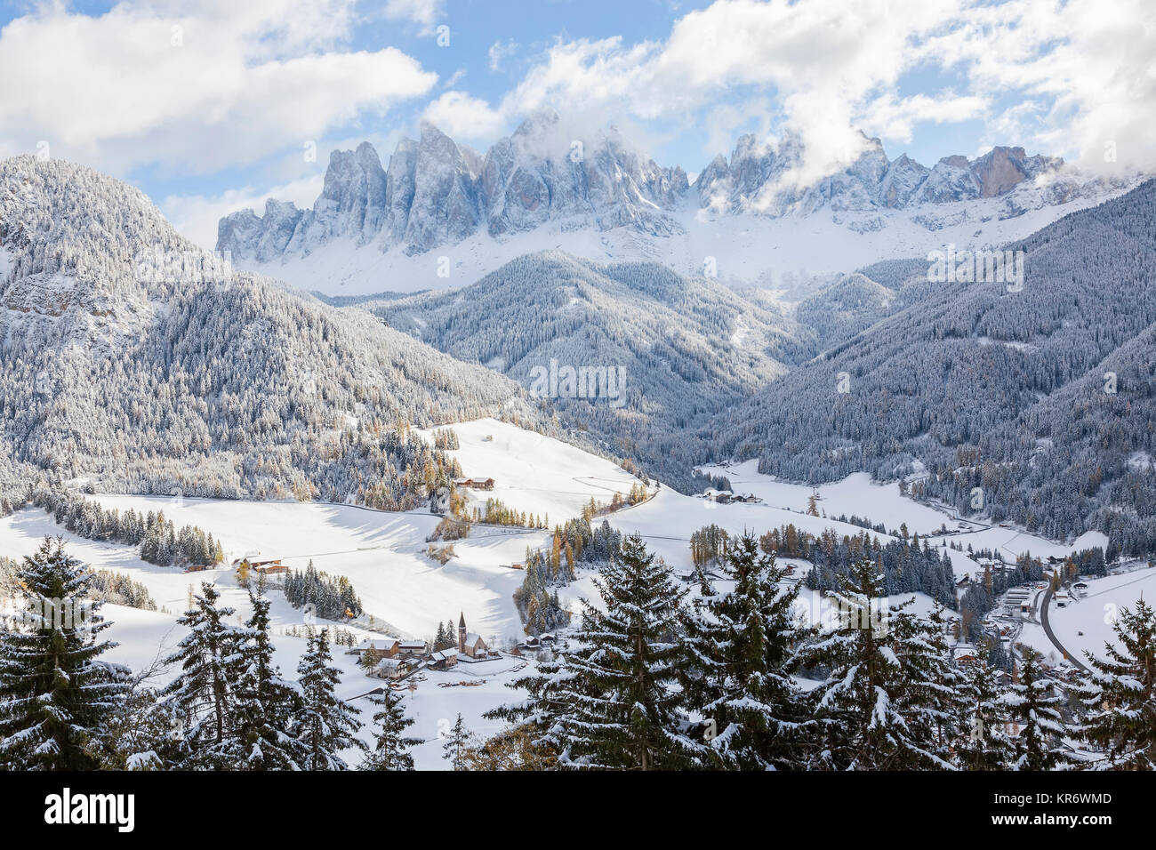 Winter landscape with valley, forest and snow-capped mountains Stock ...