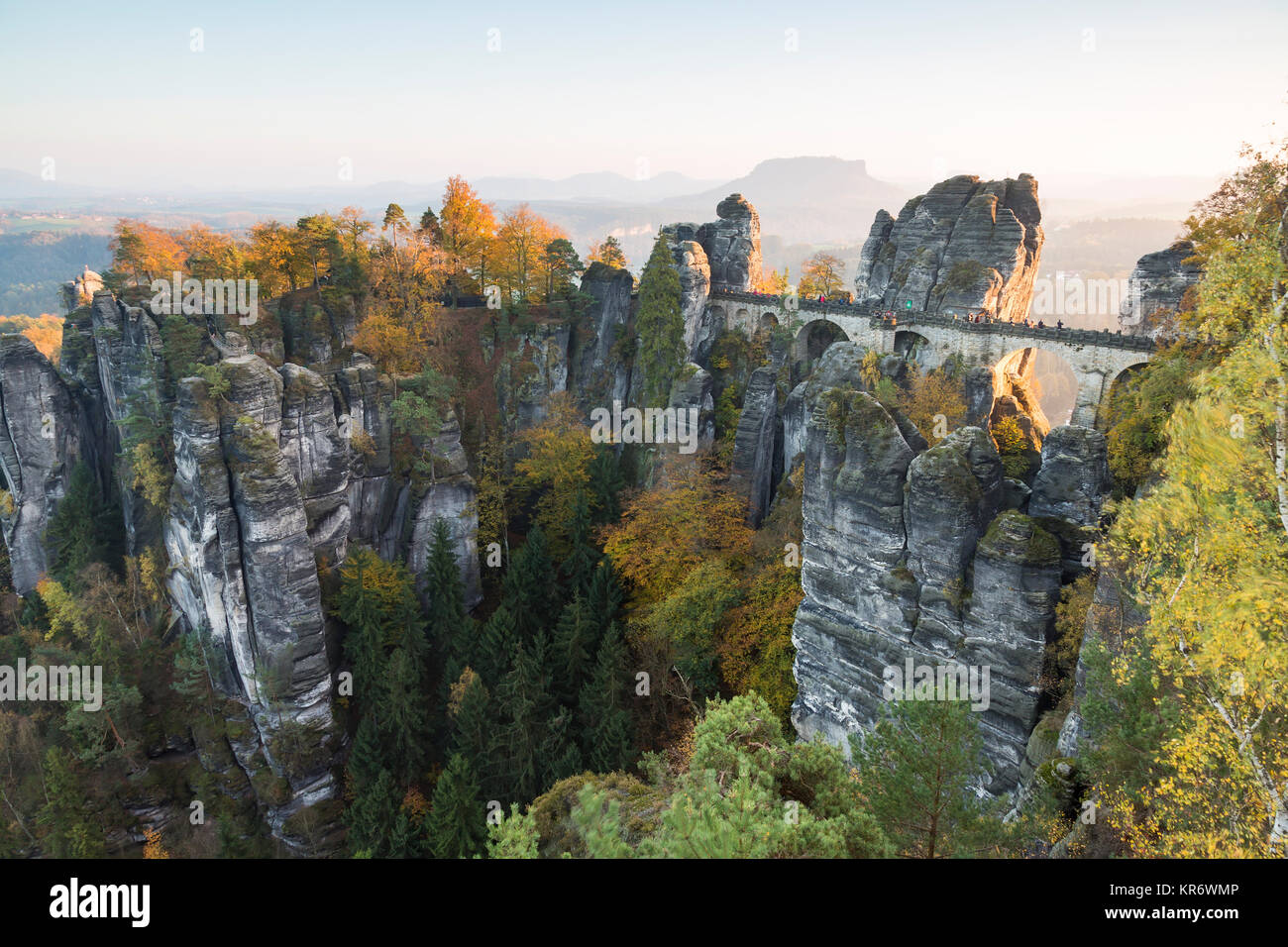 Bastei rock formation above the Elbe River with bridge linking several ...