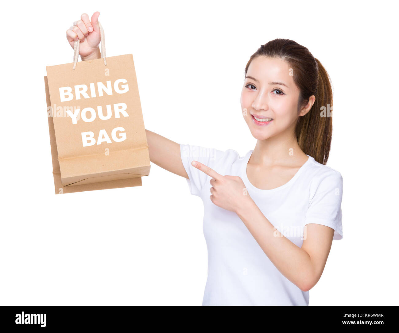 Woman finger point to shopping bag and showing phrase of bring your bag ...