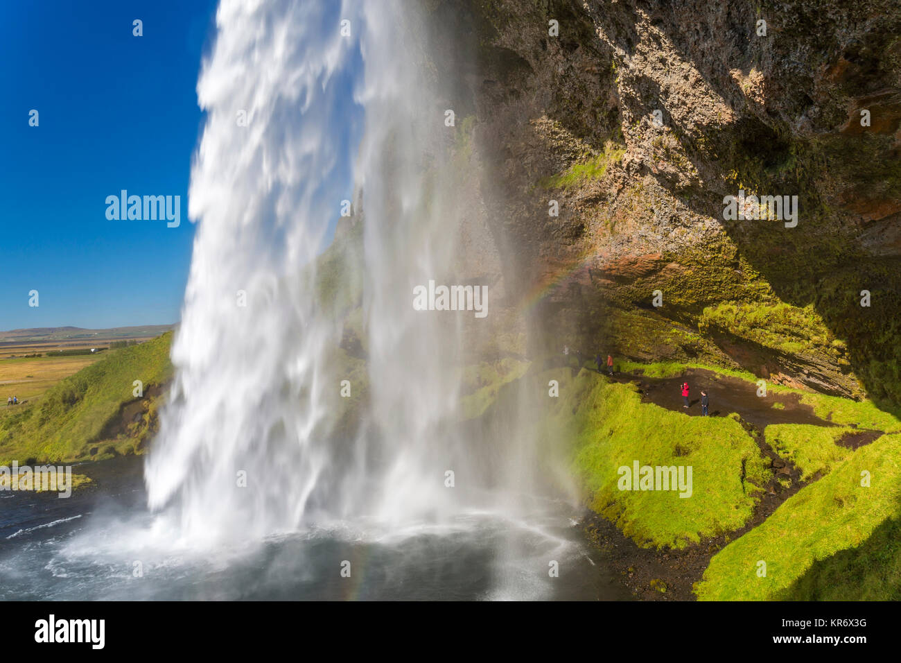 A waterfall cascade over a sheer cliff Stock Photo - Alamy