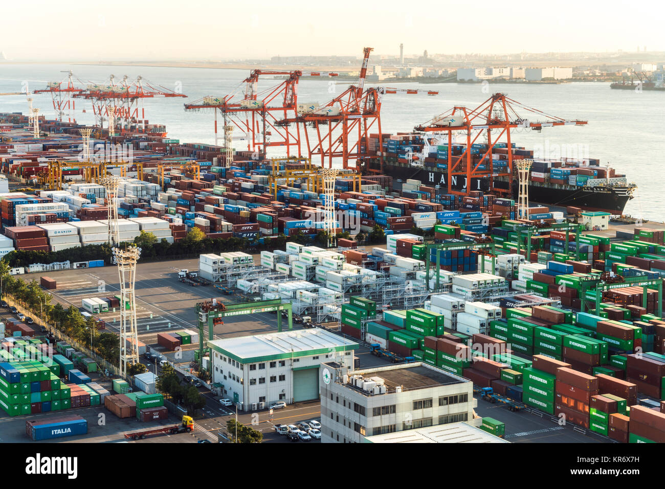 High angle view across freight harbour with stacks of cargo containers ...