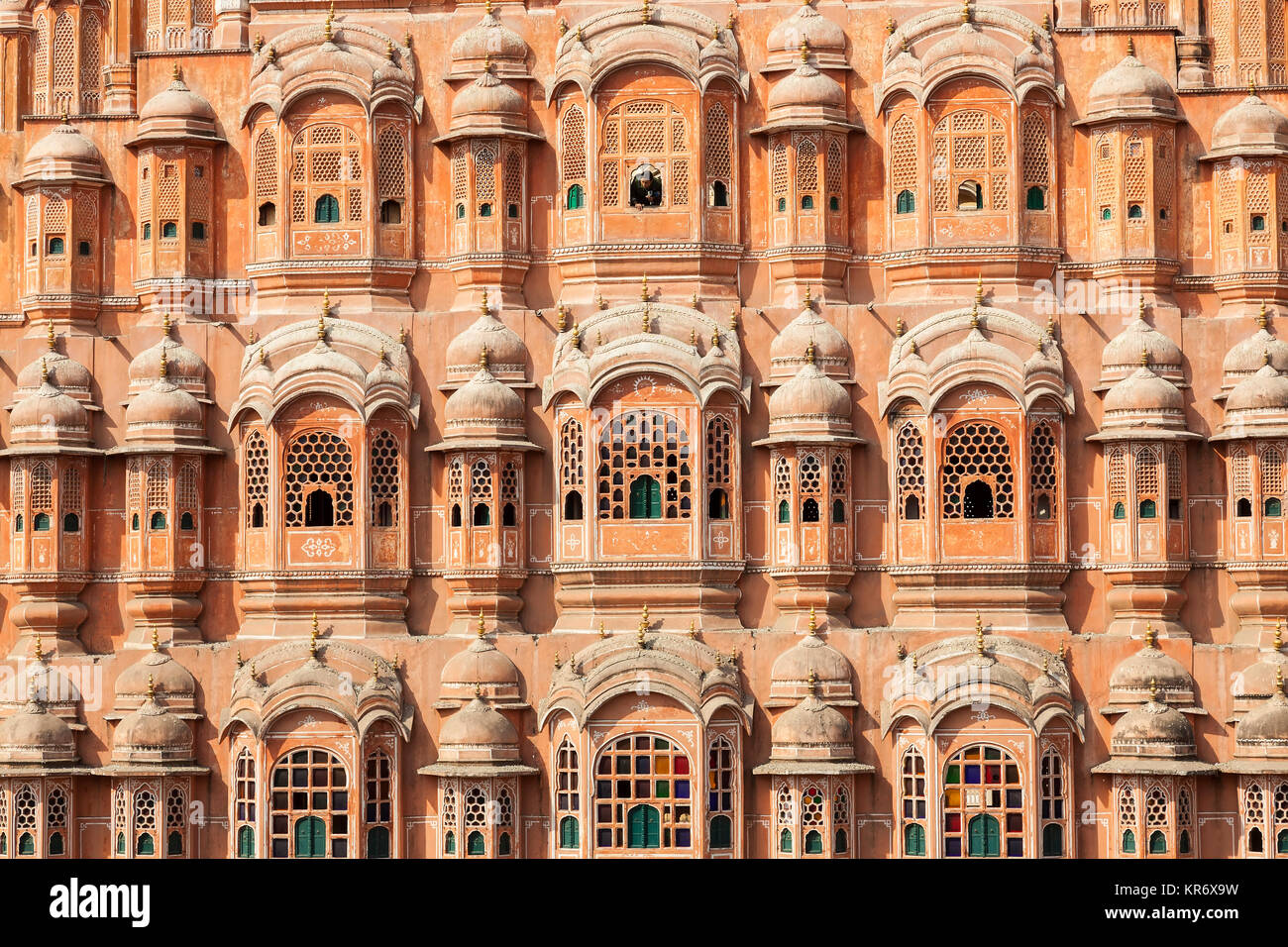 Facade of 18th century Indian palace with enclosed balconies, windows ...
