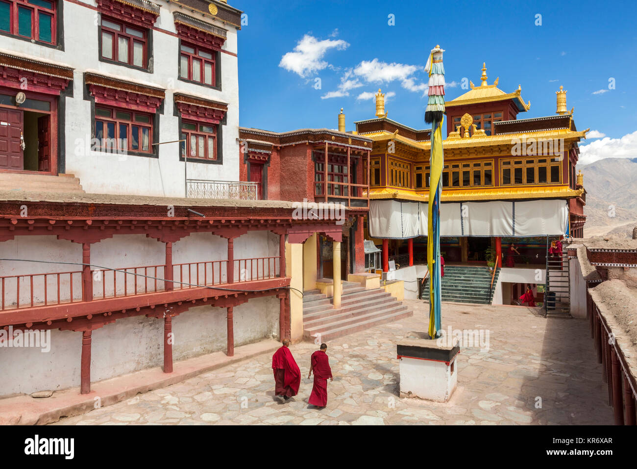 Buddhist monk walking across courtyard hi-res stock photography and ...