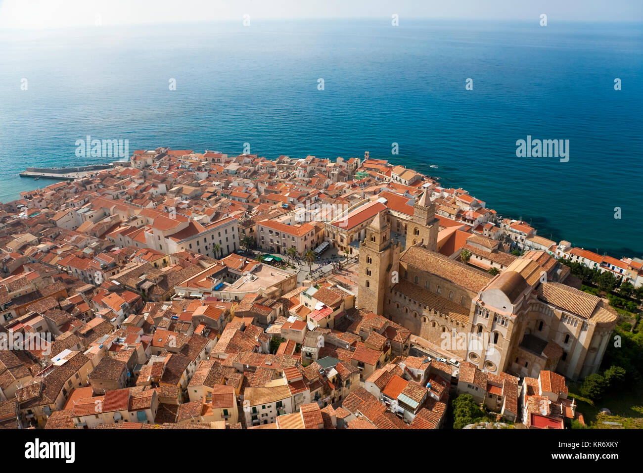 High angle view across rooftops of traditional houses and church in a ...