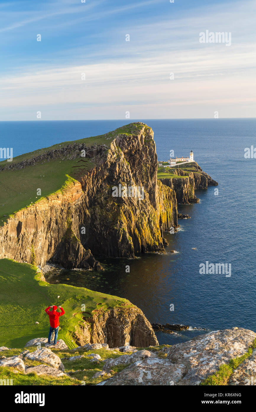 High angle view towards lighthouse on the tip of cliff point looking ...