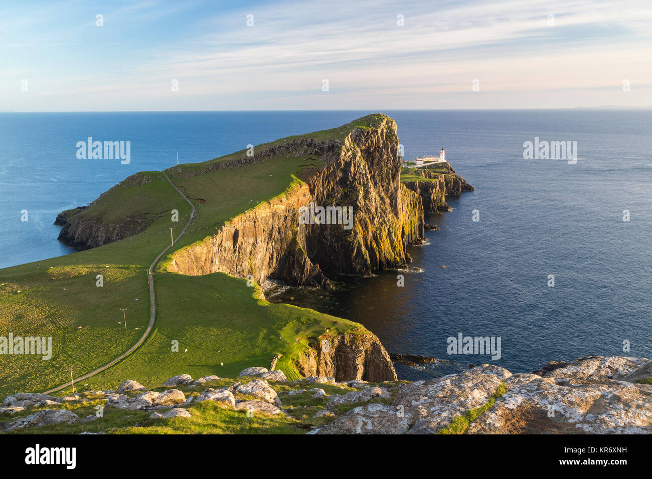 High angle view towards lighthouse on the tip of cliff point looking ...