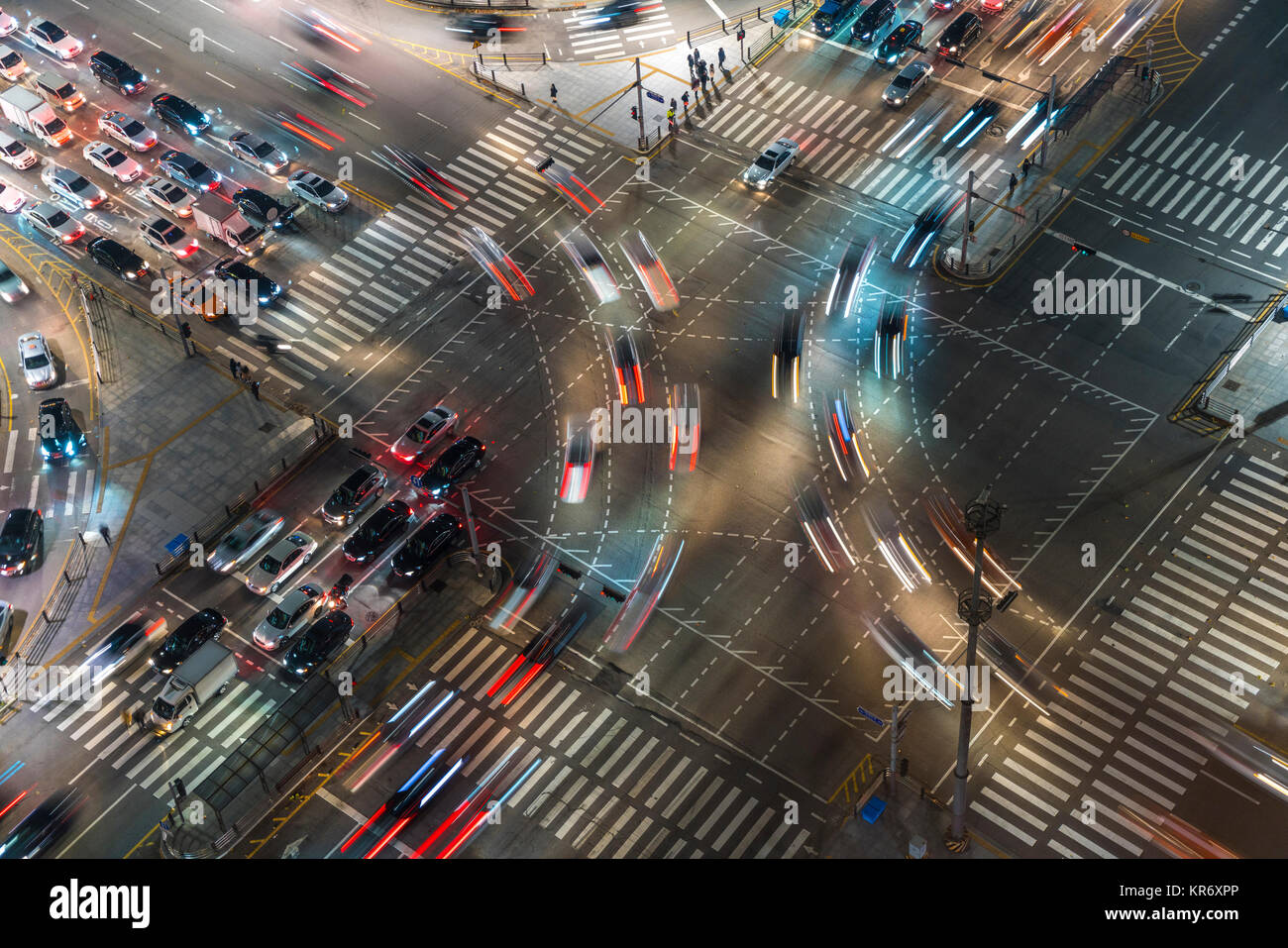 High angle view of busy urban street junction with pedestrian crossing ...