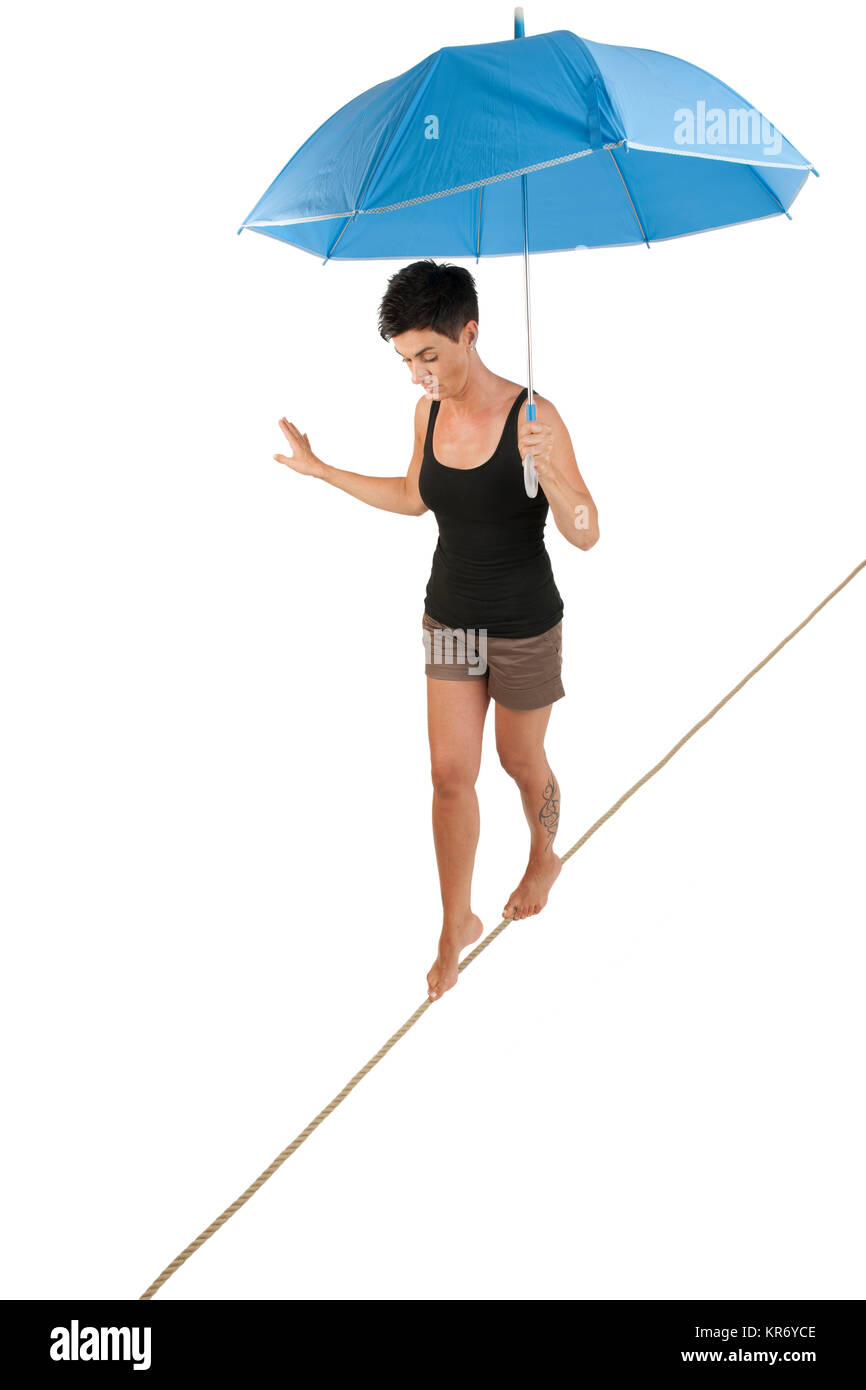 woman on the rope with umbrella Stock Photo - Alamy