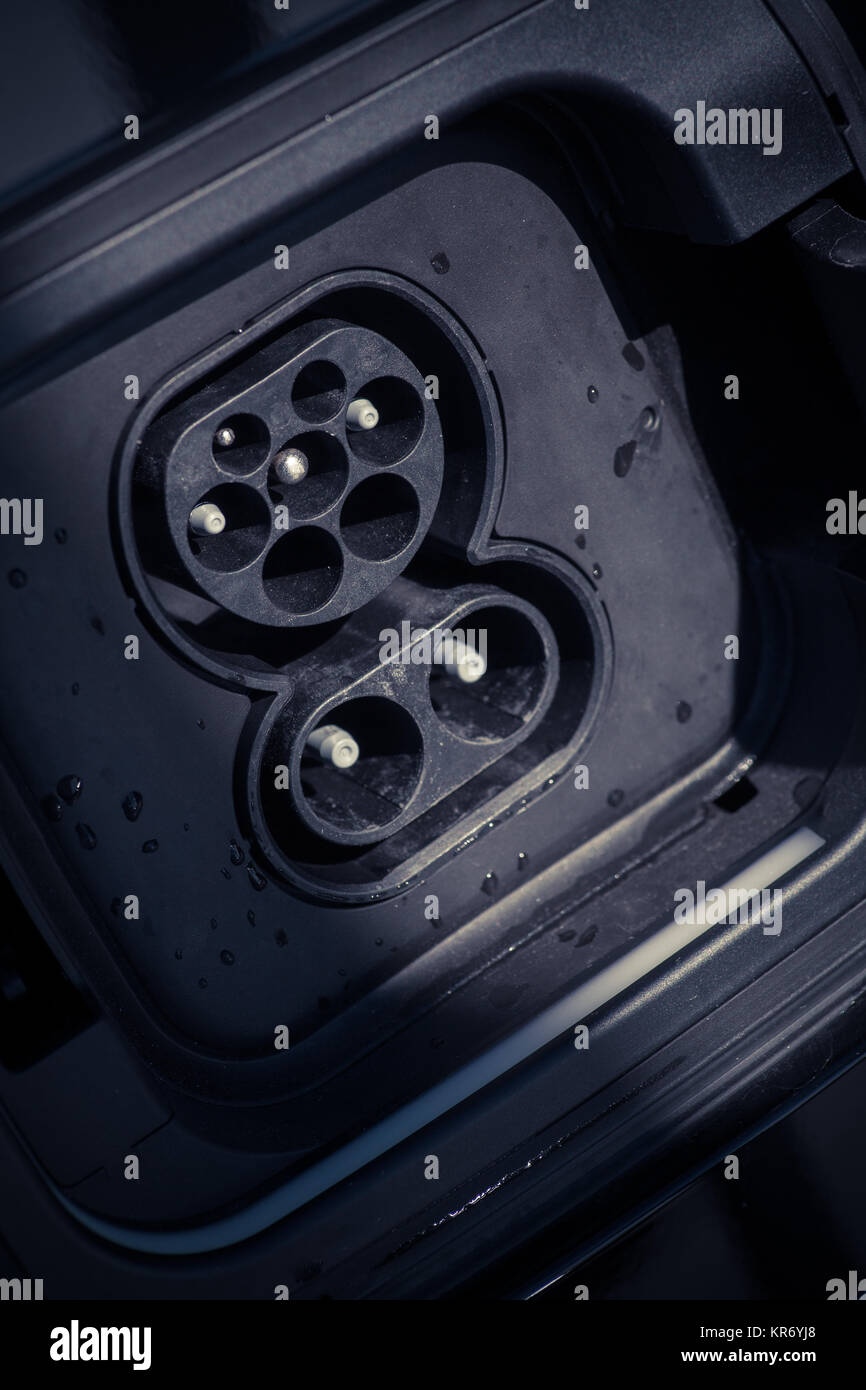 Electric car charging plug Stock Photo - Alamy