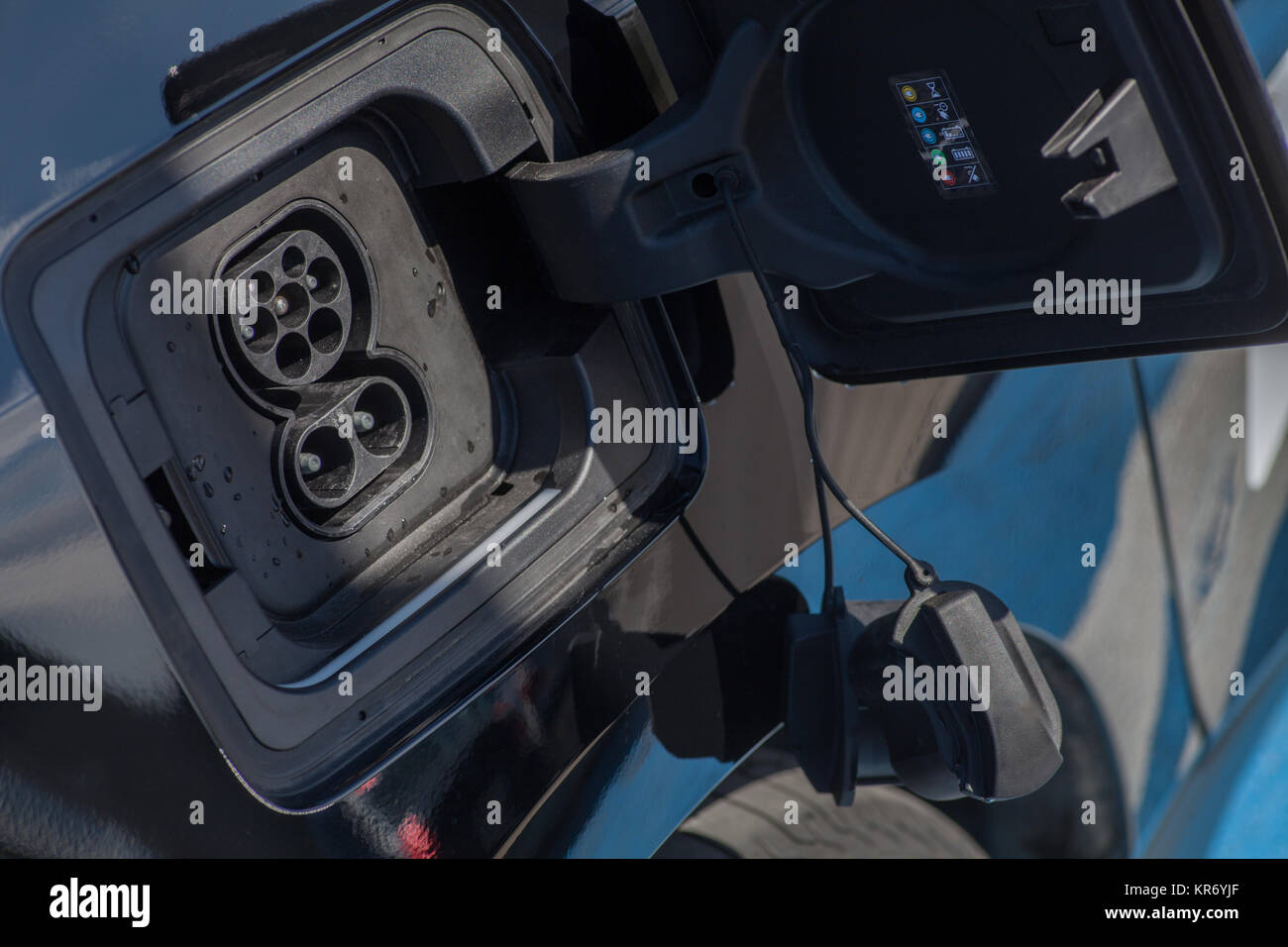 Electric car charging plug Stock Photo - Alamy