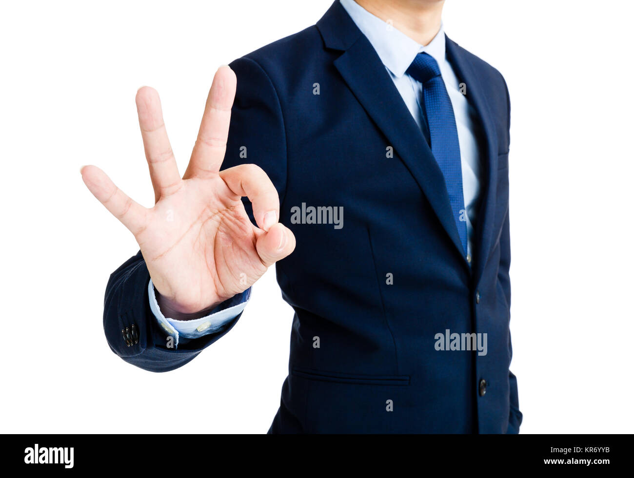 Businessman showing ok sign Stock Photo - Alamy