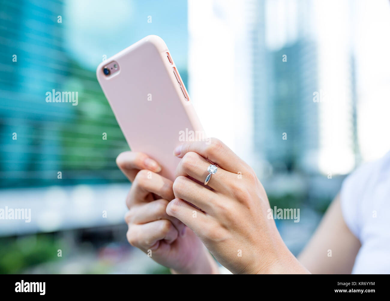 Woman using cellphone Stock Photo - Alamy