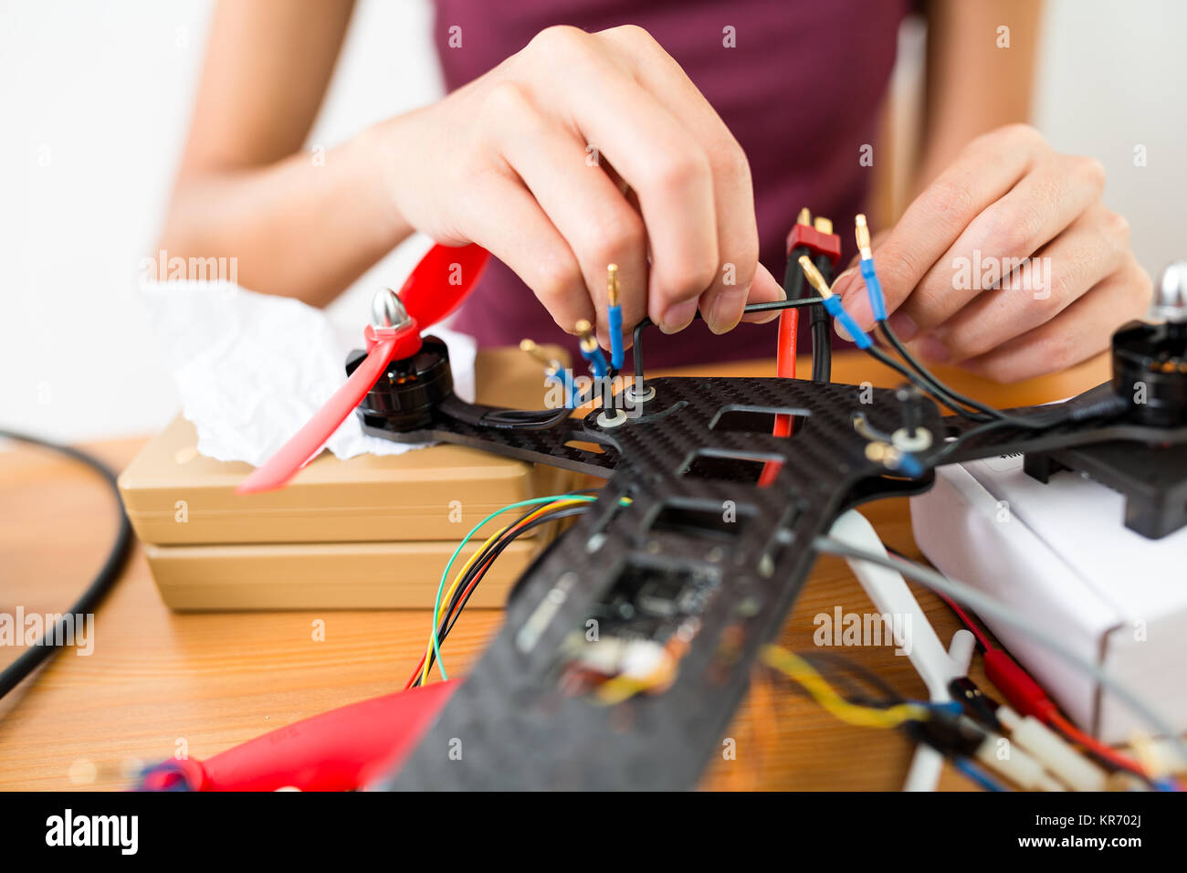 Building of flying drone with connecting cable Stock Photo - Alamy