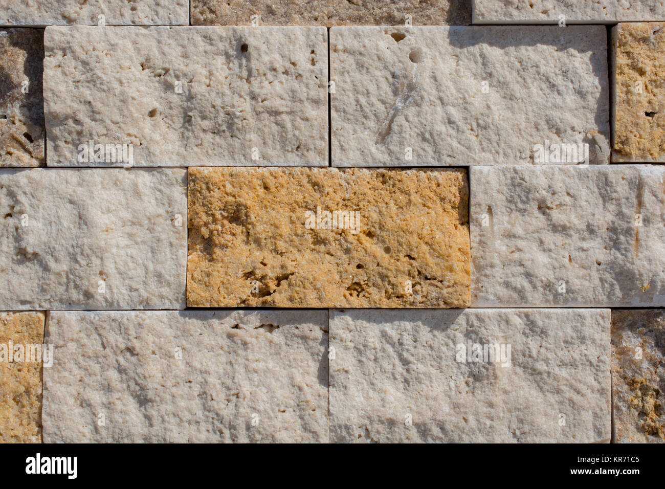 Decorative cubic stone wall as background texture Stock Photo - Alamy