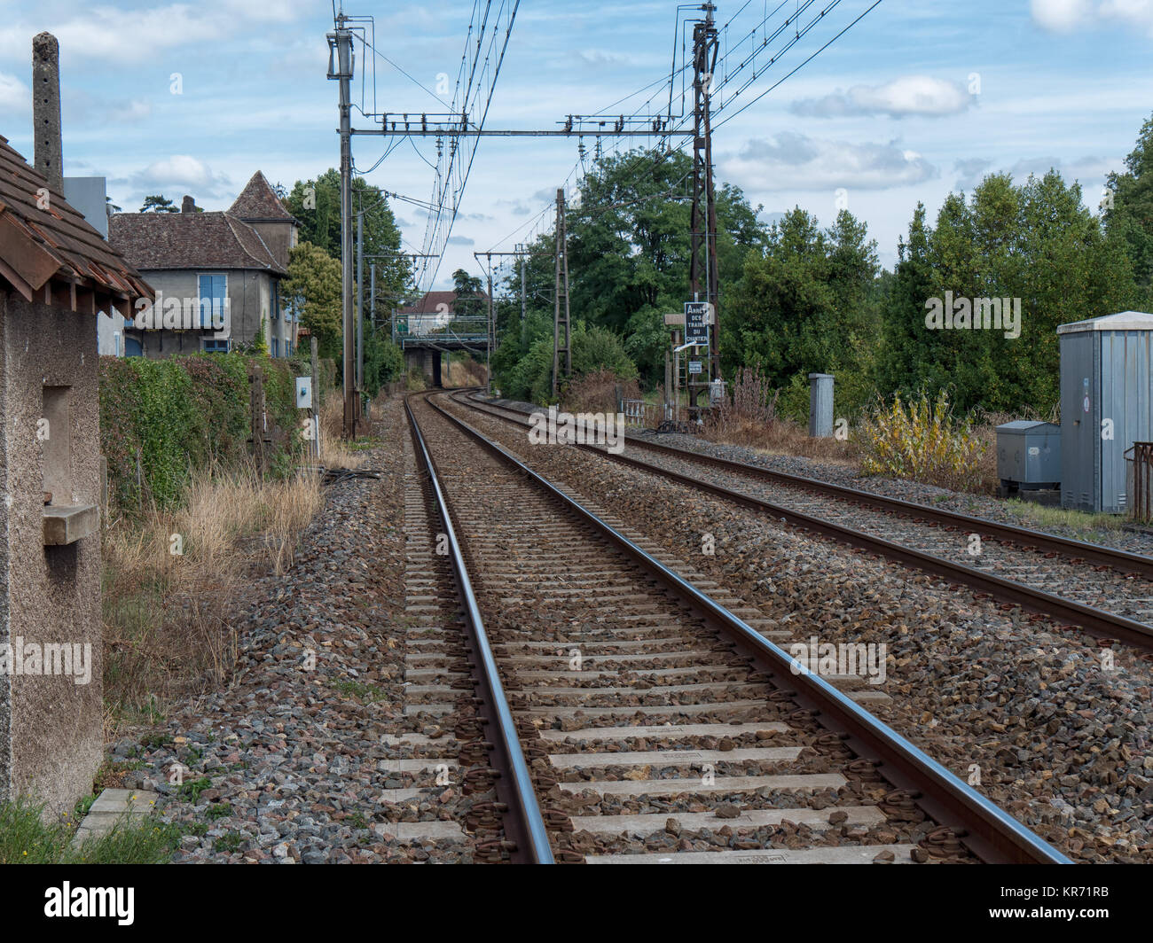 Railway track with a village in France Stock Photo - Alamy