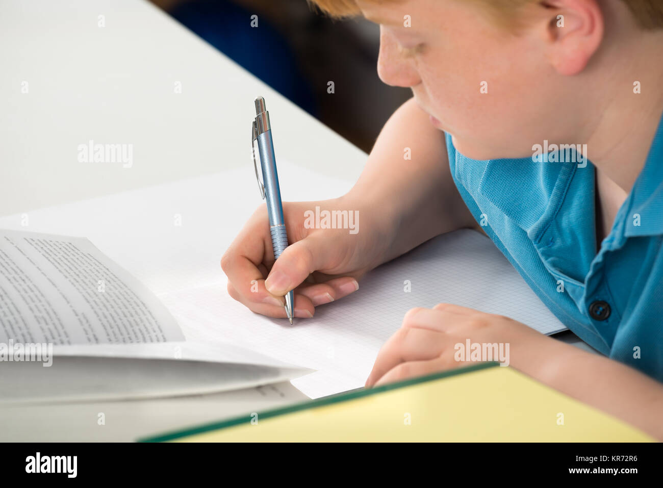 Boy Doing His Homework Stock Photo - Alamy