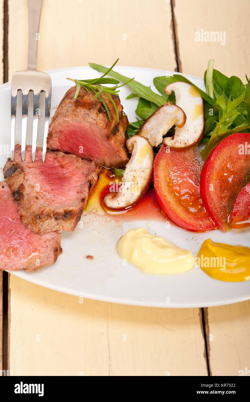 beef filet mignon grilled with vegetables Stock Photo - Alamy