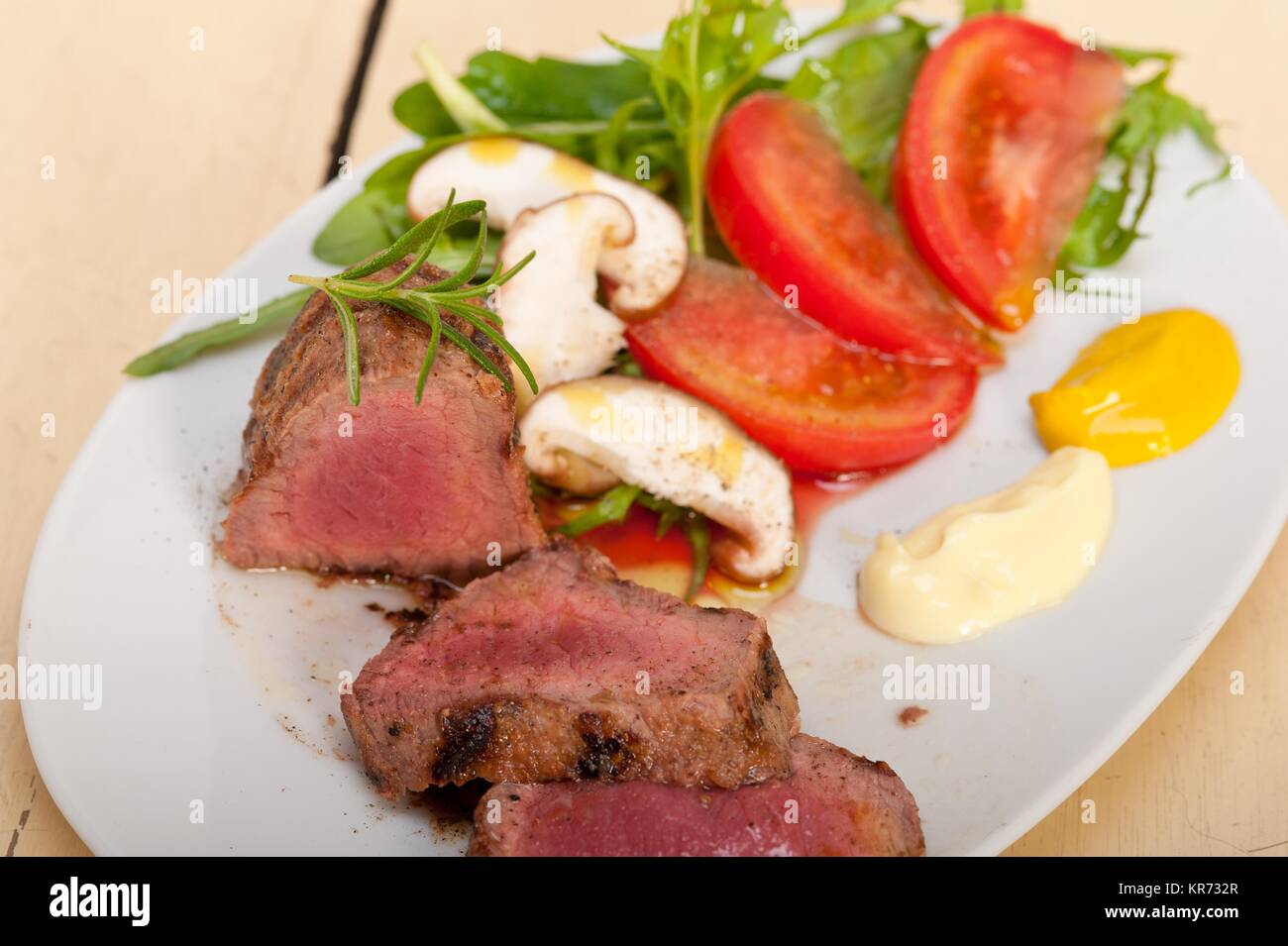 beef filet mignon grilled with vegetables Stock Photo - Alamy
