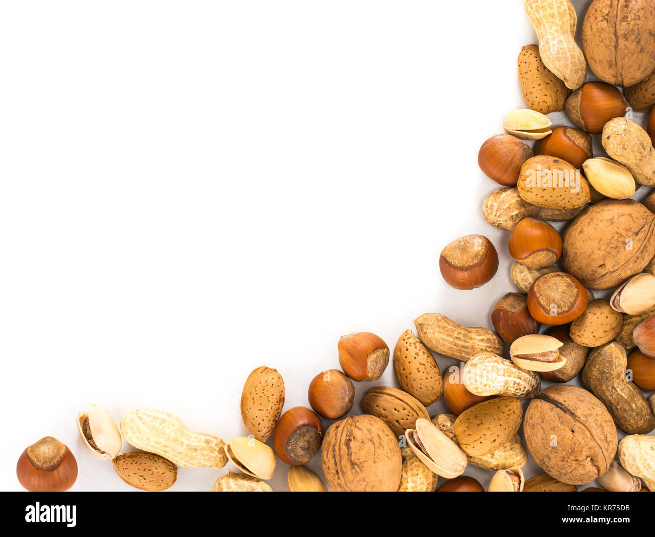 Background of mixed nuts with copy space Stock Photo - Alamy