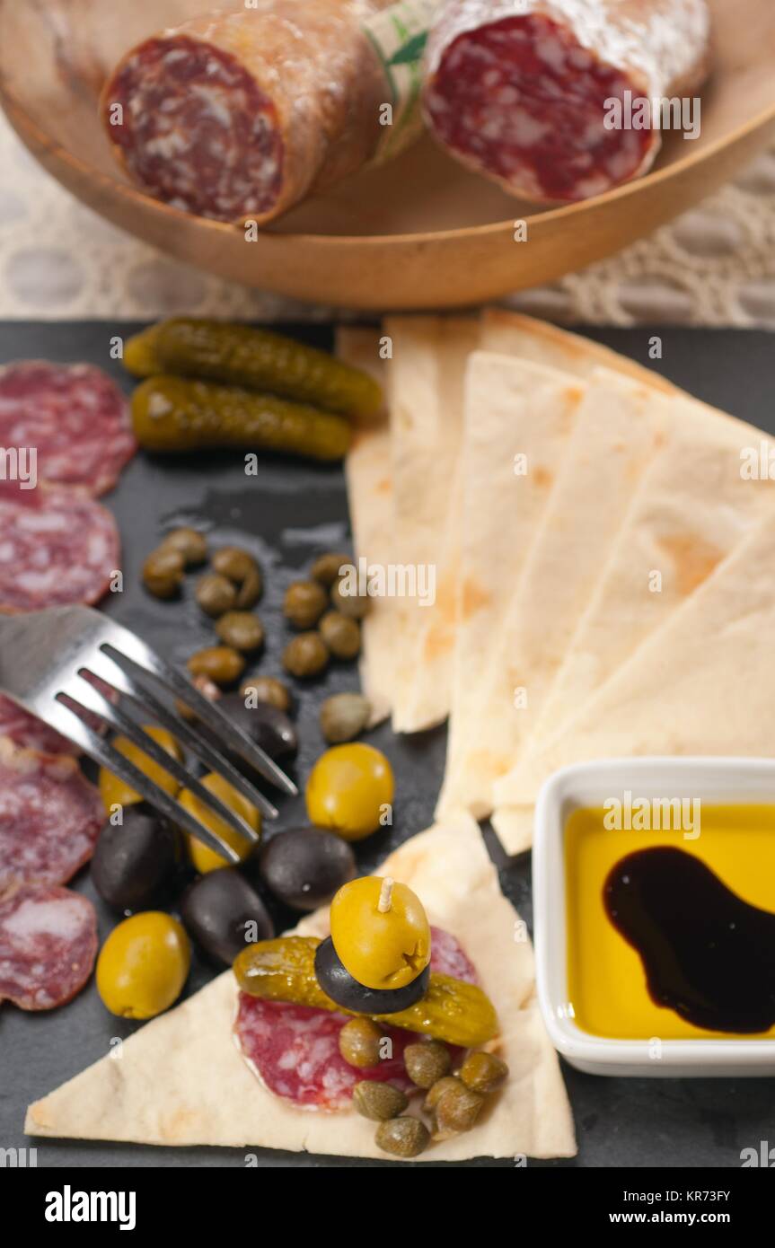 cold cut platter with pita bread and pickles Stock Photo - Alamy