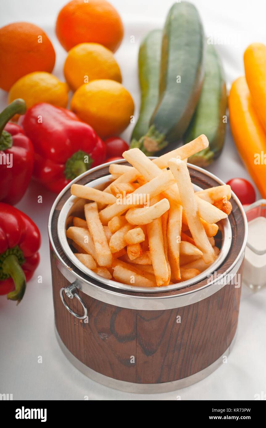 fresh french fries on a bucket Stock Photo - Alamy