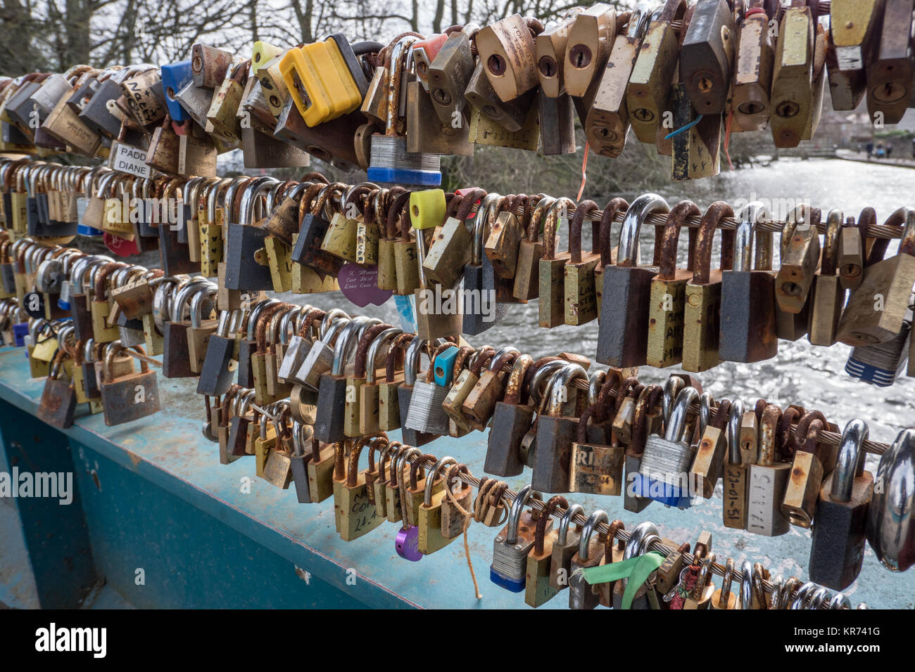 Love locks secured to the Bridge over the River Wye in Bakewell ...