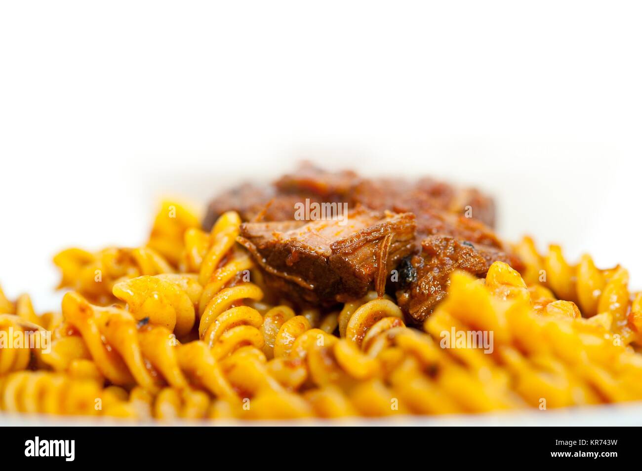 fusilli pasta with neapolitan style ragu meat sauce Stock Photo - Alamy