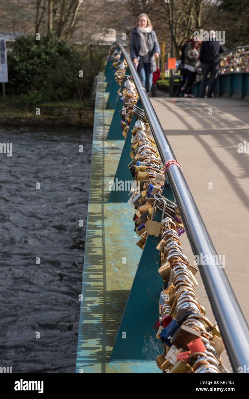 Love locks secured to the Bridge over the River Wye in Bakewell ...