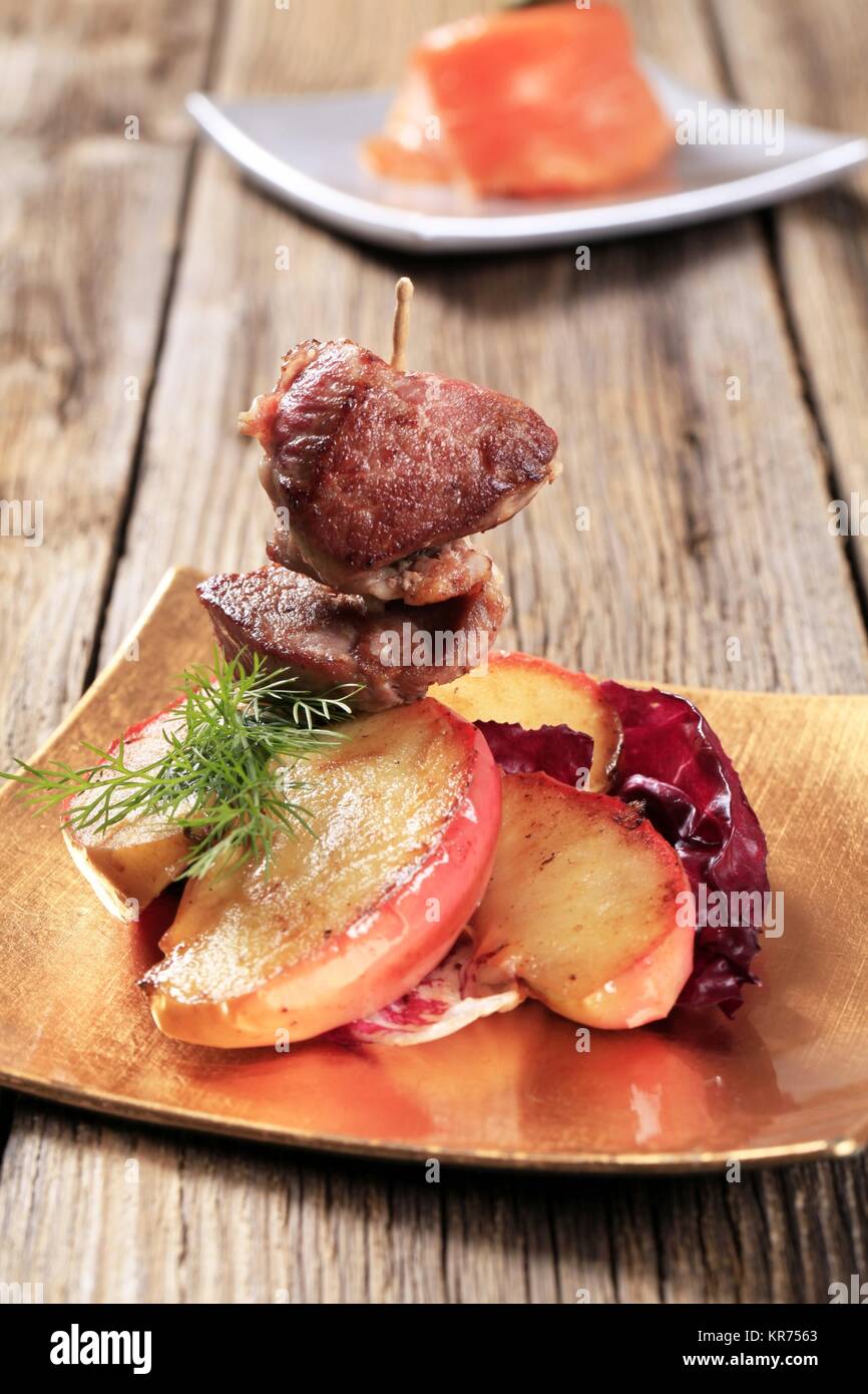 Roasted meat and apple Stock Photo - Alamy
