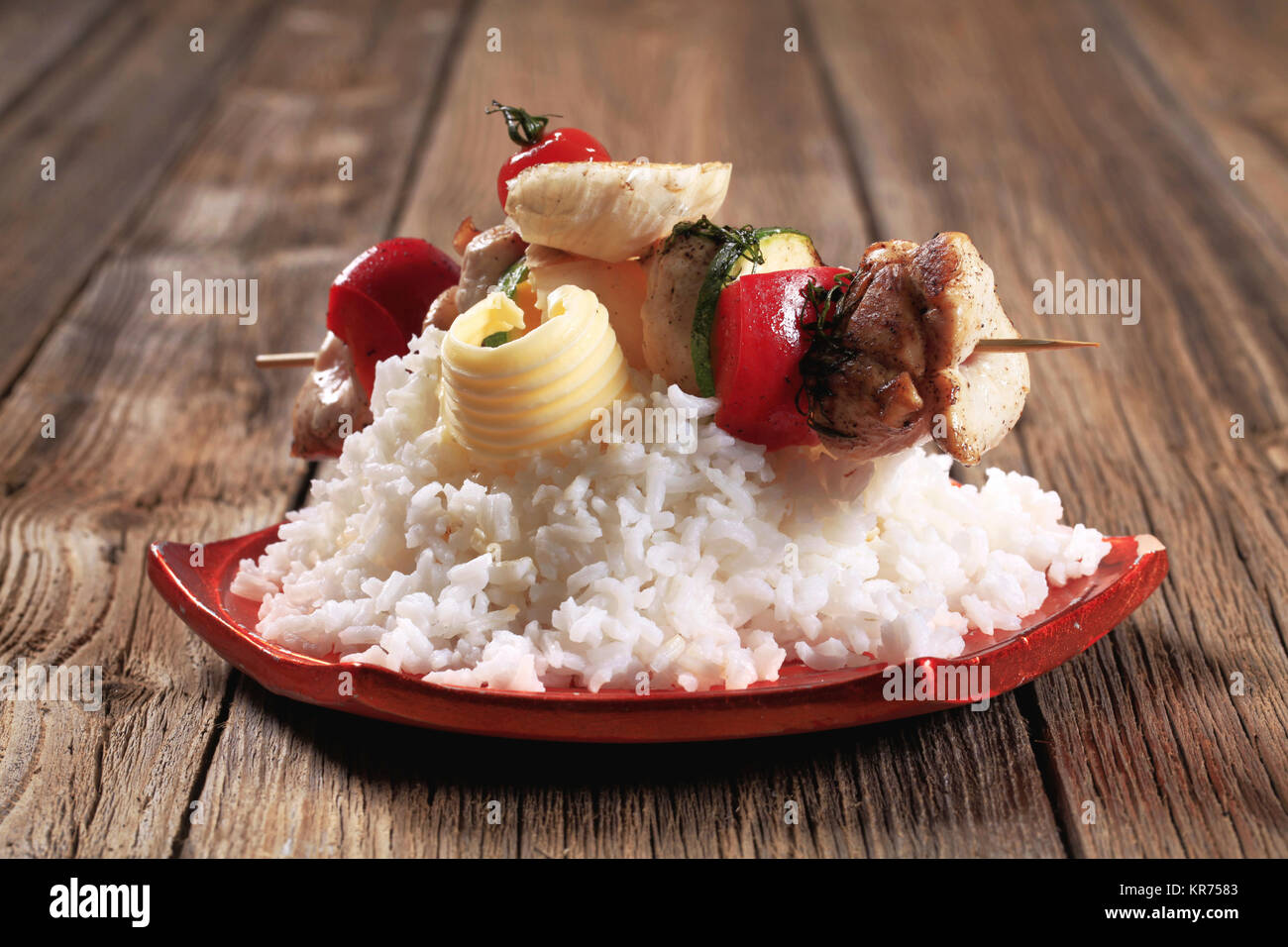 Chicken shish kebab with white rice Stock Photo - Alamy