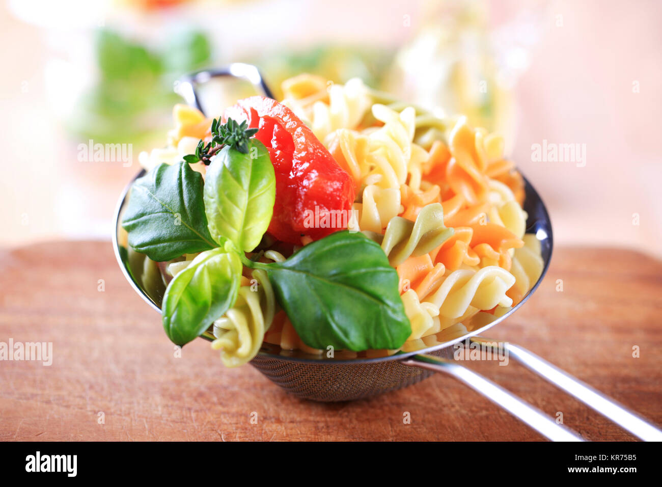 Tricolor corkscrew pasta Stock Photo - Alamy