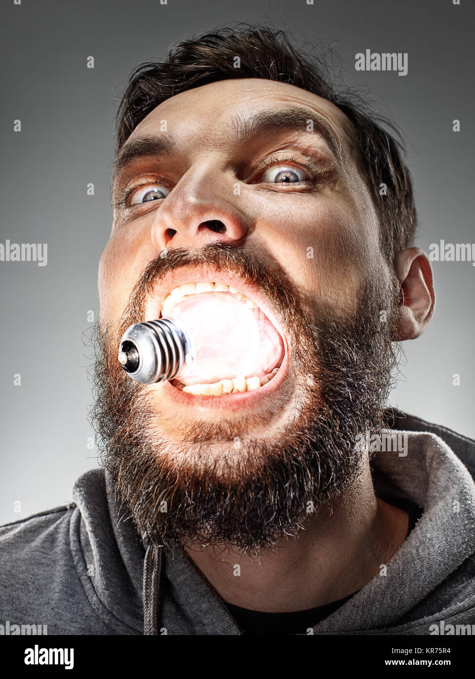 Electric bulb in mouth hi-res stock photography and images - Alamy