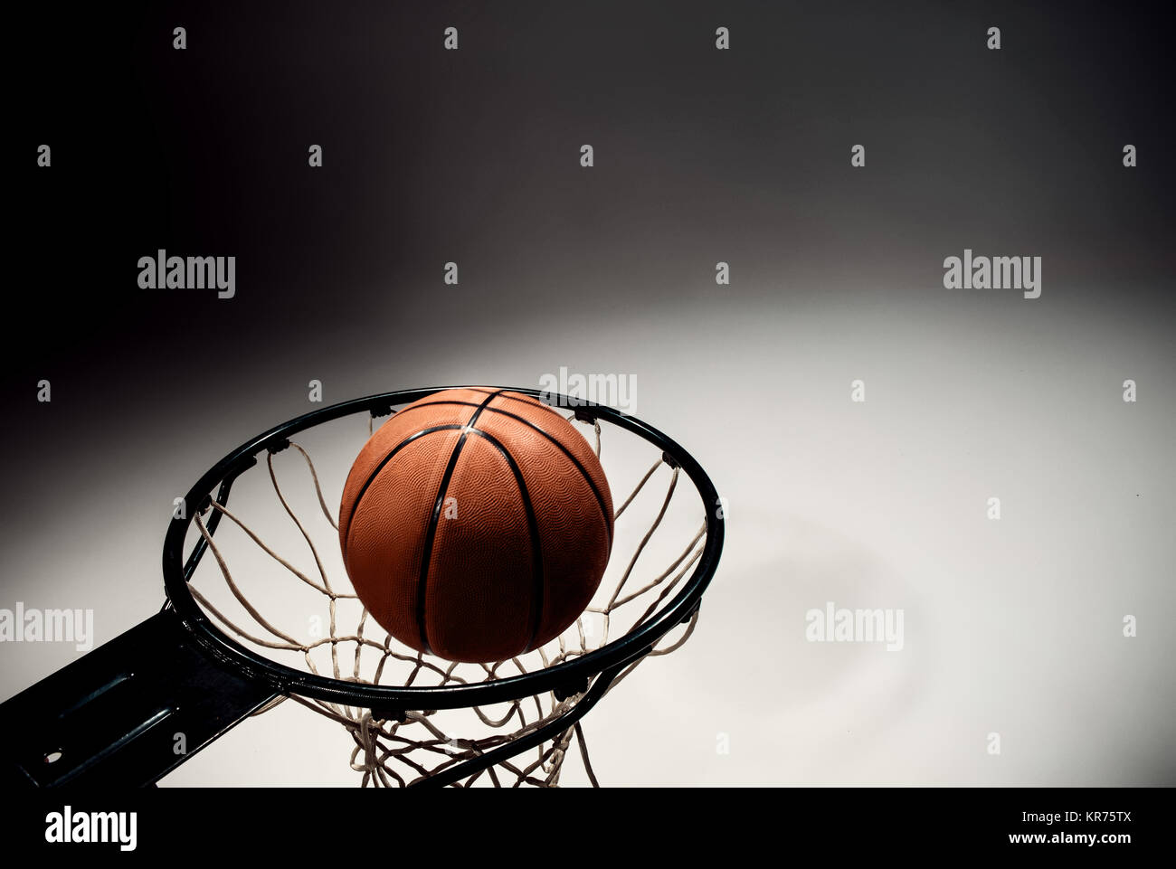 Basketball board and basketball ball on gray background Stock Photo - Alamy