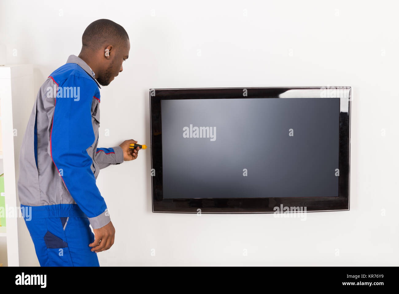 Male Technician Repairing Television Stock Photo - Alamy