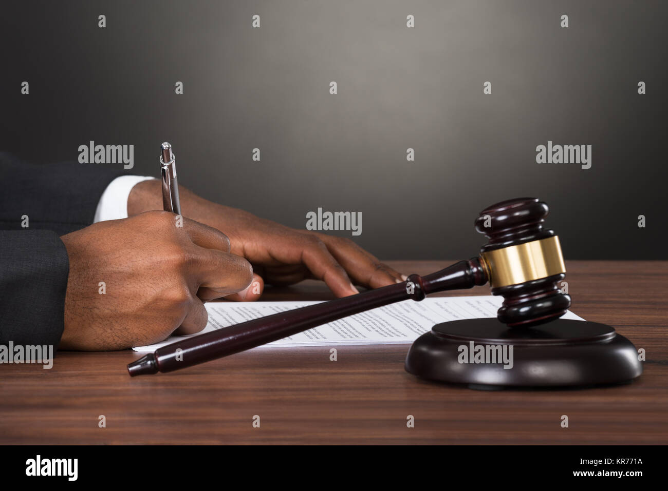 Close-up Of A Judge Writing On Paper Stock Photo - Alamy